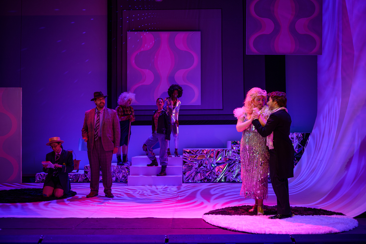 A fine cast of young singers persist within a distracting ...